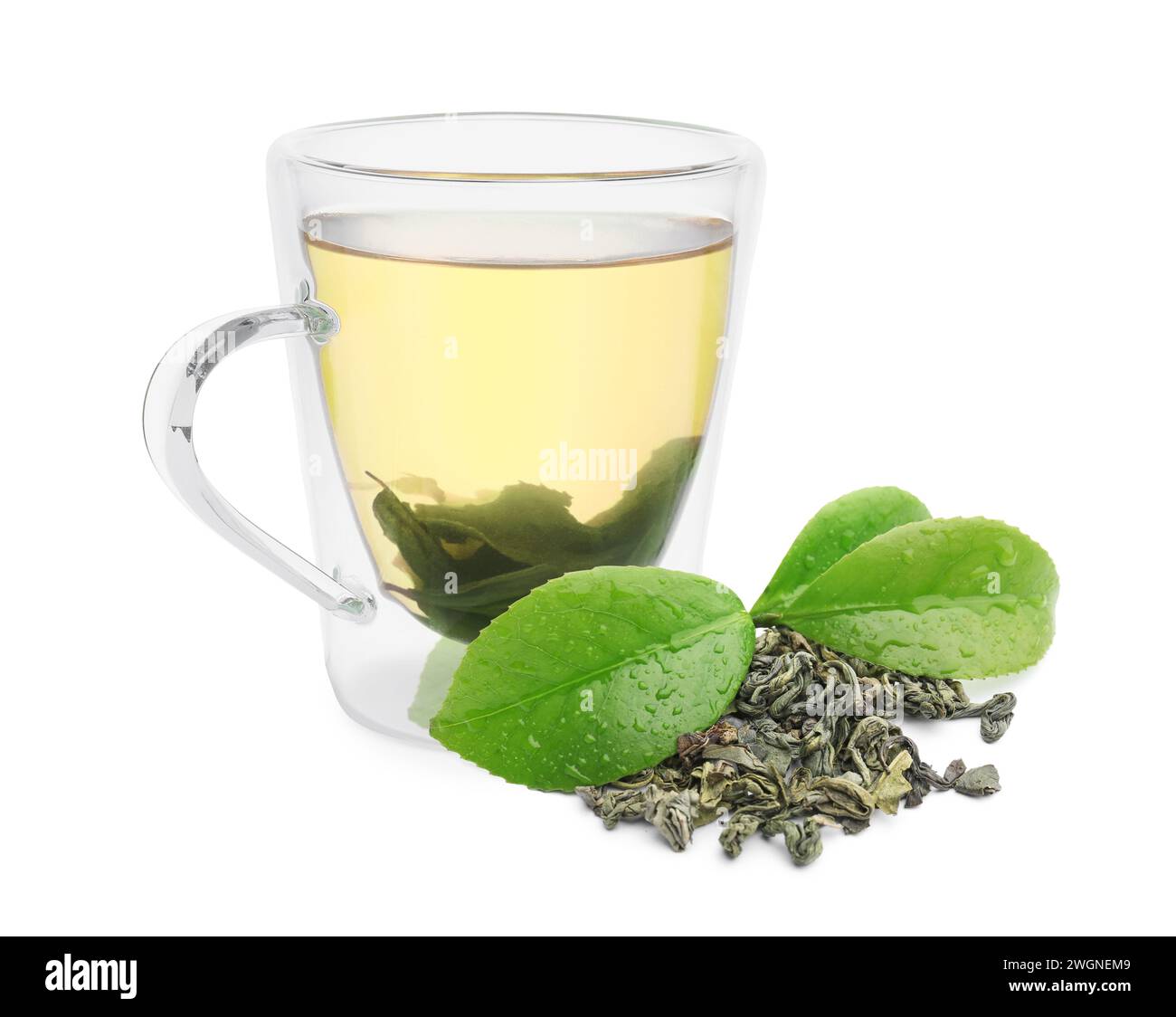 Green tea in glass cup, fresh and dried leaves isolated on white Stock ...