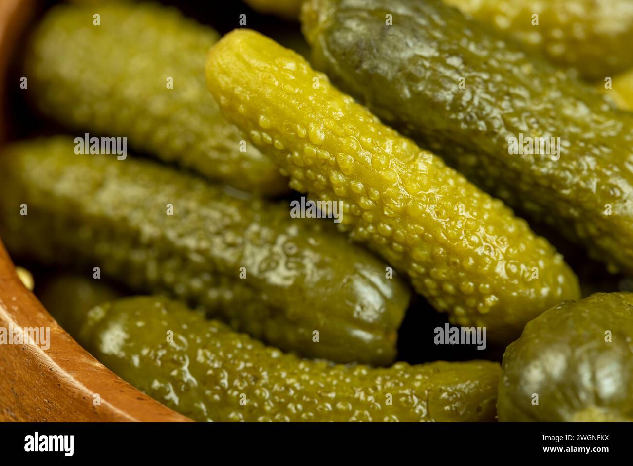 green pickled cucumbers on the table, crispy salted pickled cucumbers ...
