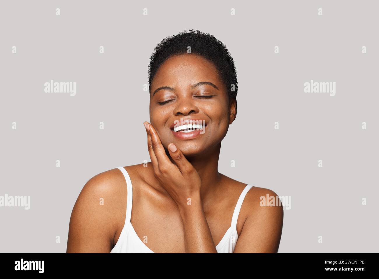 Beautiful African American female model with healthy fresh clear dark ...