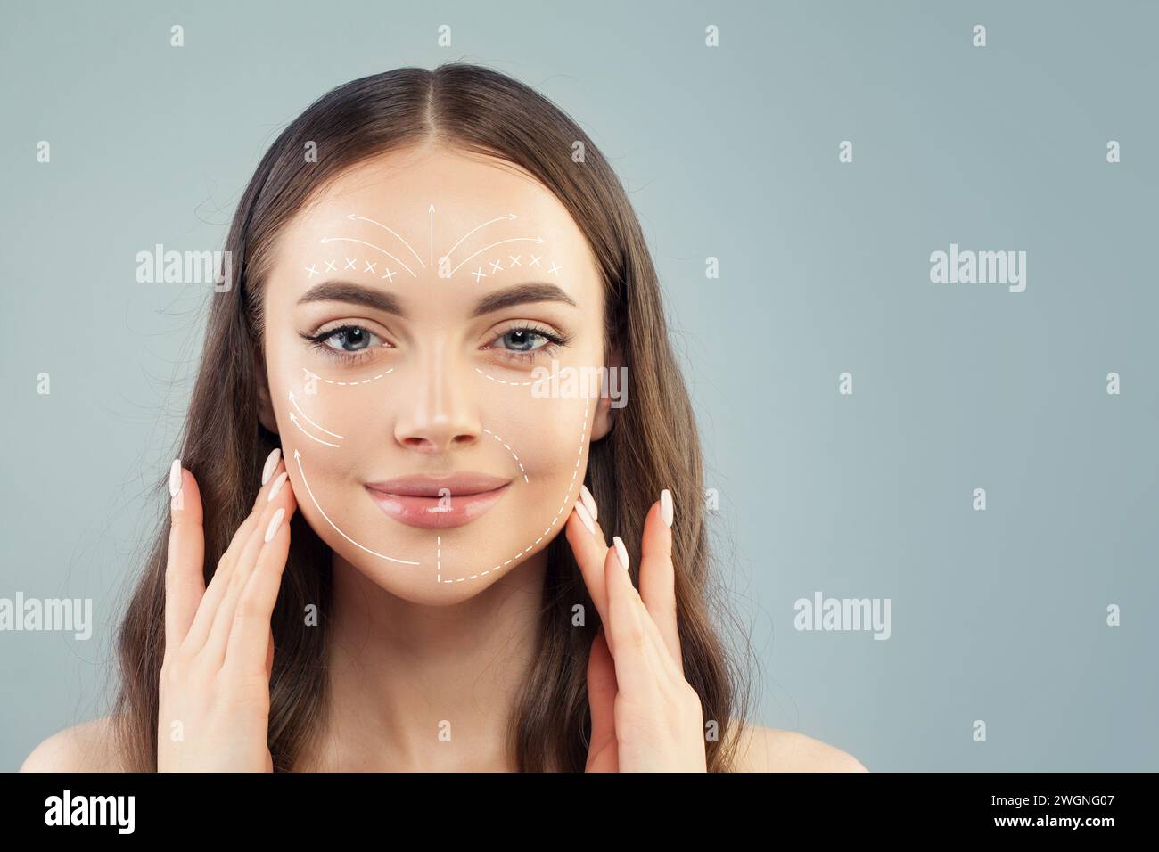 Plastic surgery concept. Woman face with marks and arrows on skin ...