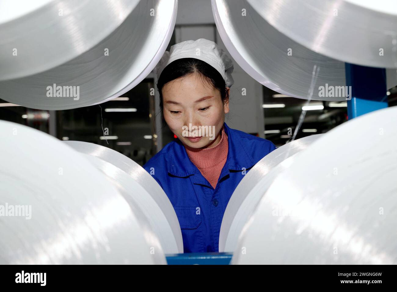 SUQIAN, CHINA - FEBRUARY 6, 2024 - An employee checks the quality of ...