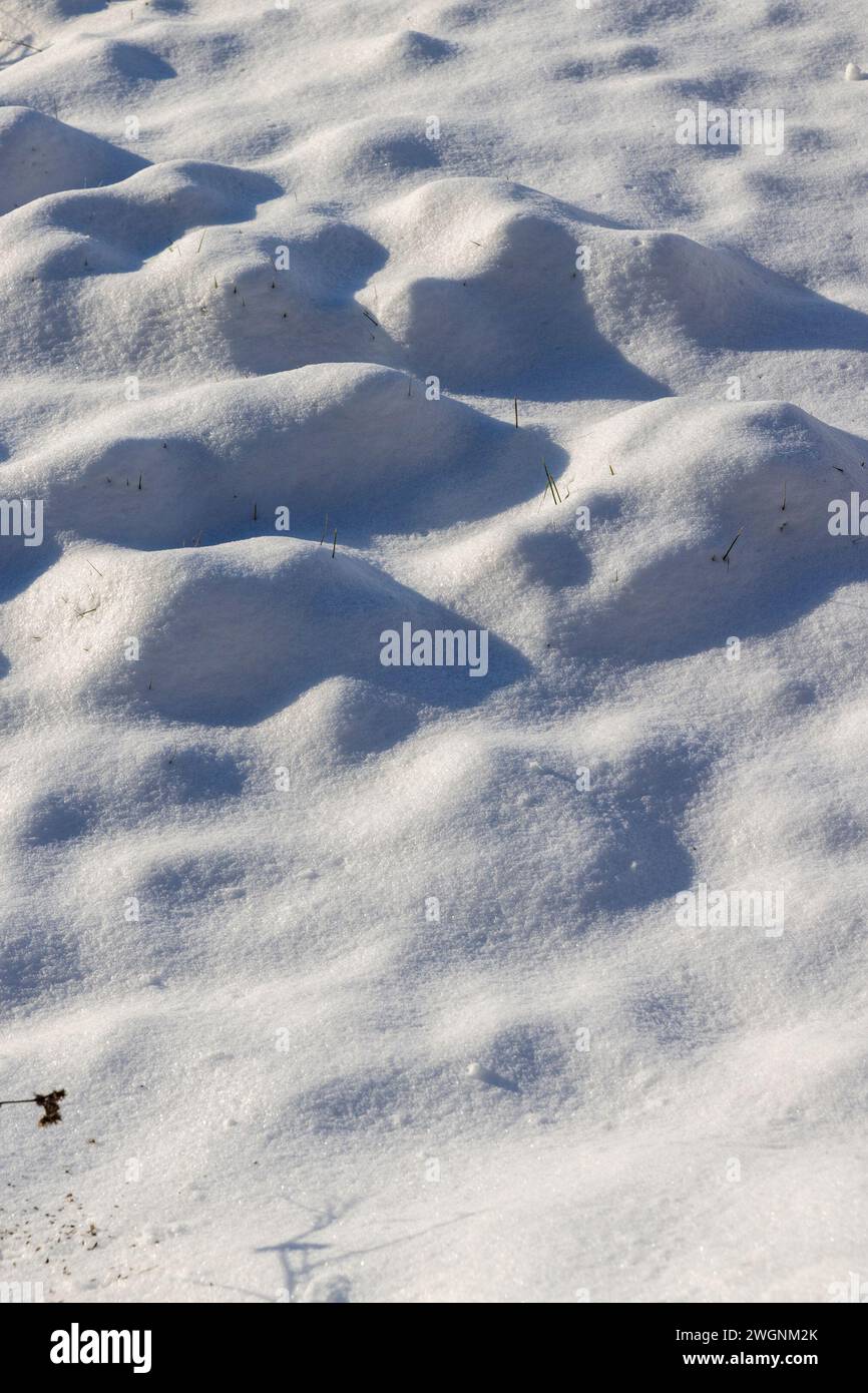 drifts of white pure snow after a snowfall, beautiful white snow in the ...