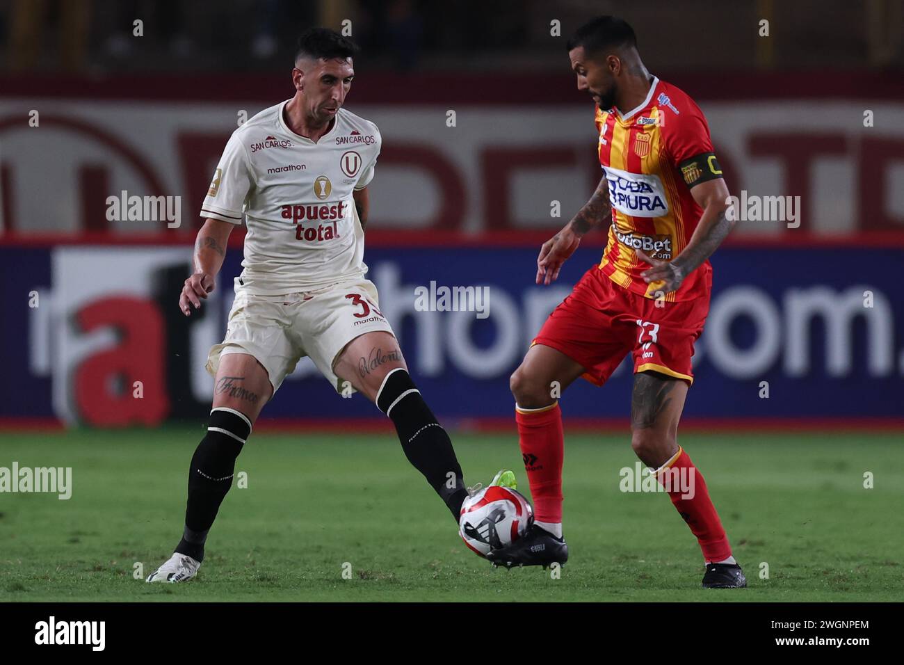 Diego Dorregaray of Universitario de Deportes and Daniel Franco of ...