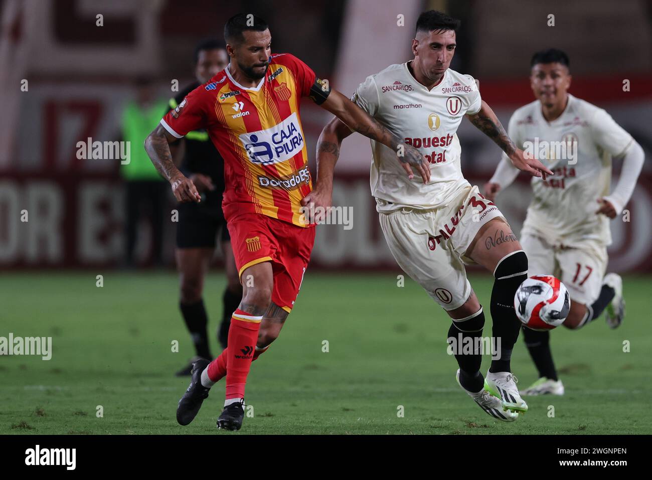 Diego Dorregaray of Universitario de Deportes and Daniel Franco of ...