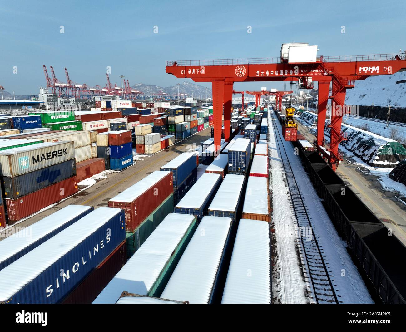 LIANYUNGANG, CHINA - FEBRUARY 6, 2024 - Large machinery is used to load ...