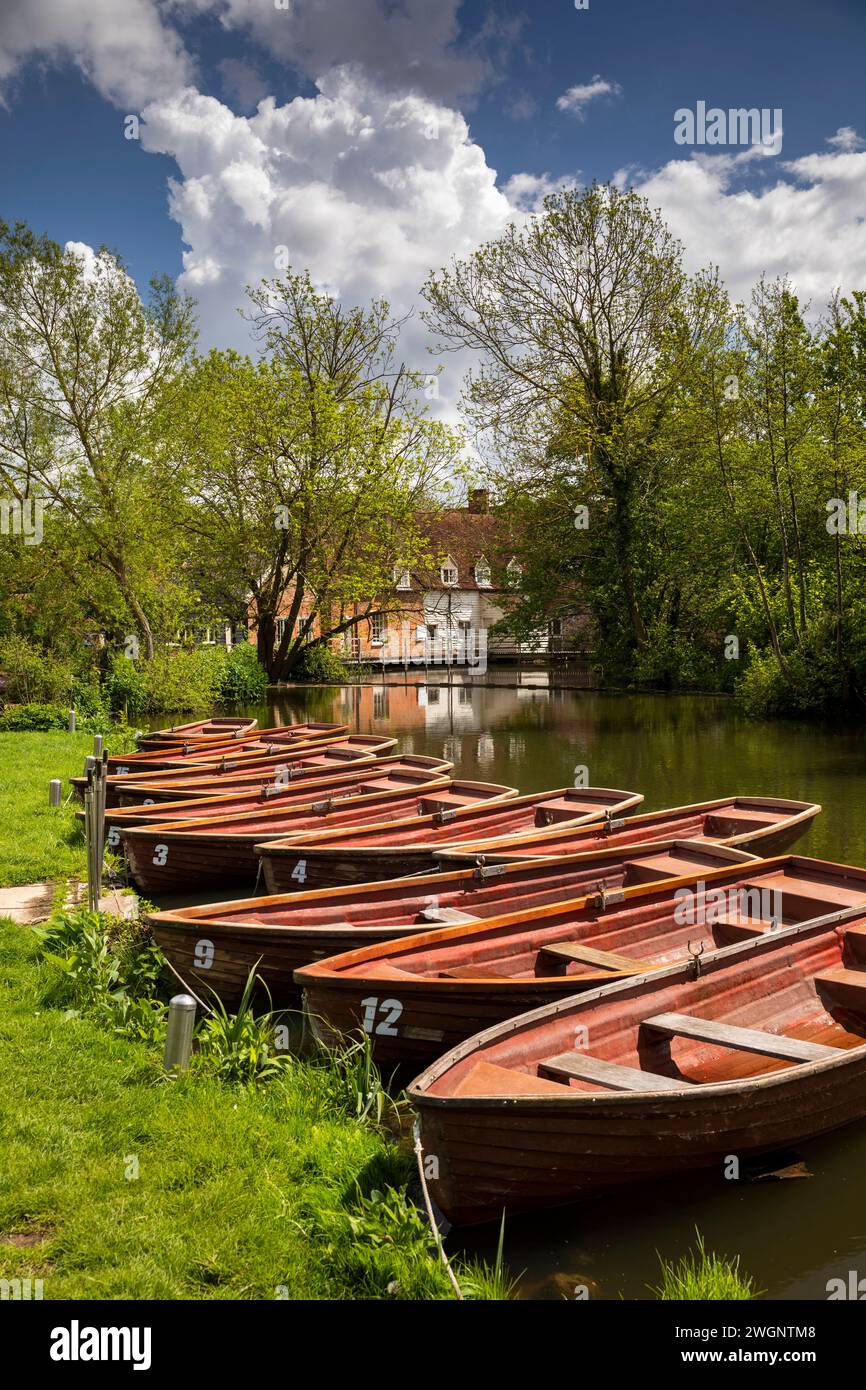 UK, England, Suffolk, Flatford, rowing boats on River Stour mill race ...