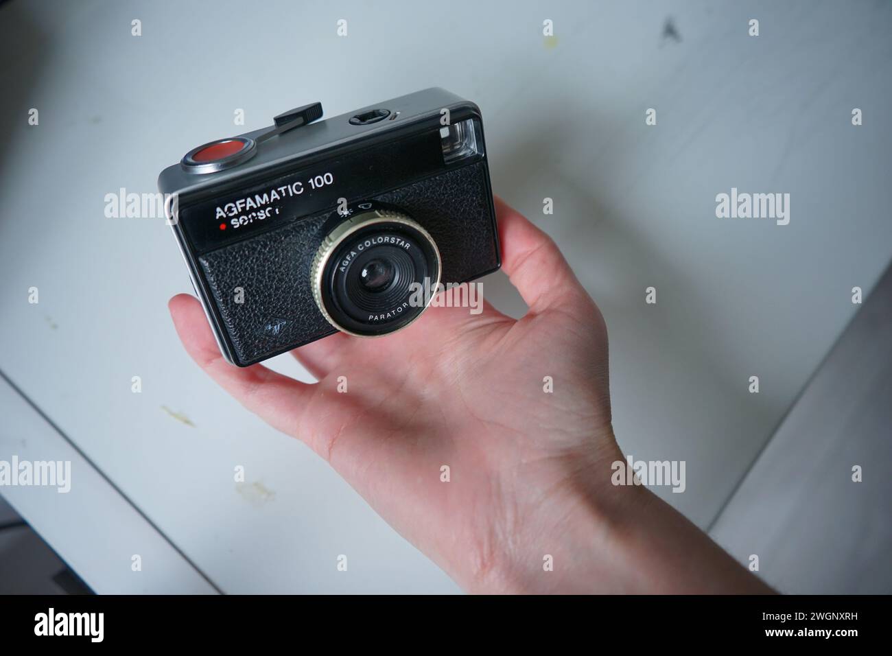 Agfamatic 100 sensor film photography camera on a white desk Stock ...