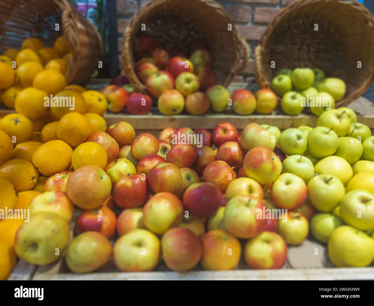 various types of apples and oranges on display Stock Photo - Alamy