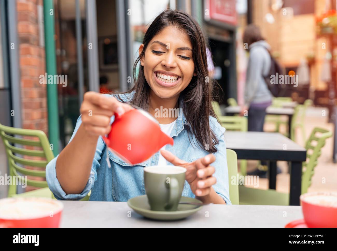 Indian woman drinking tea hi-res stock photography and images - Alamy