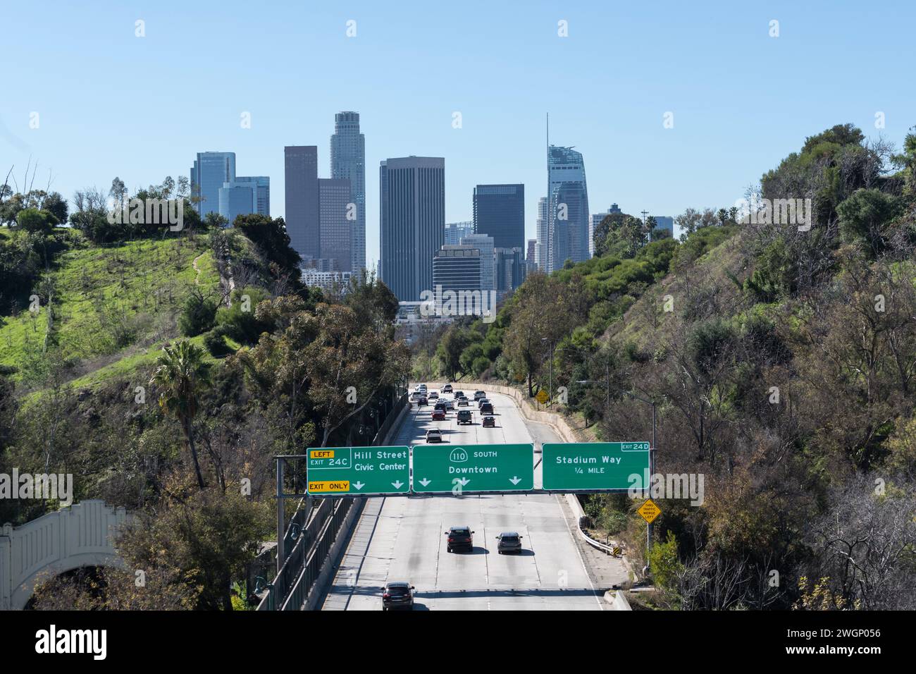 Los Angeles skyline and 110 freeway downtown arrow sign Stock Photo - Alamy