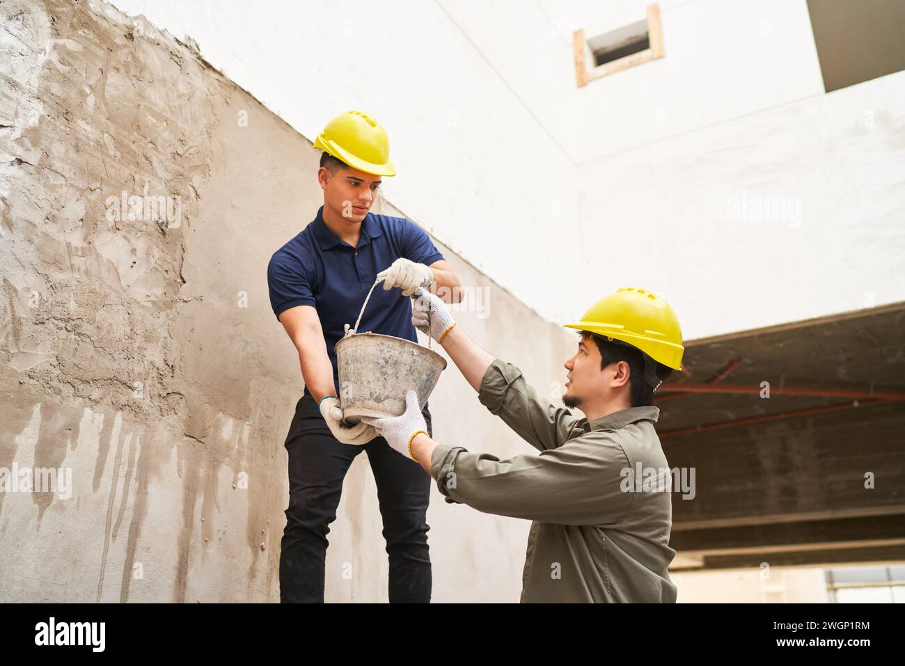 Carrying bucket hi-res stock photography and images - Alamy