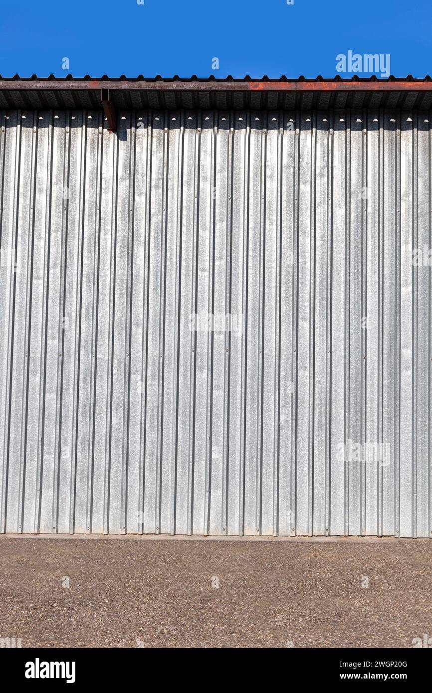 corrugated aluminum warehouse side wall with roof Stock Photo - Alamy