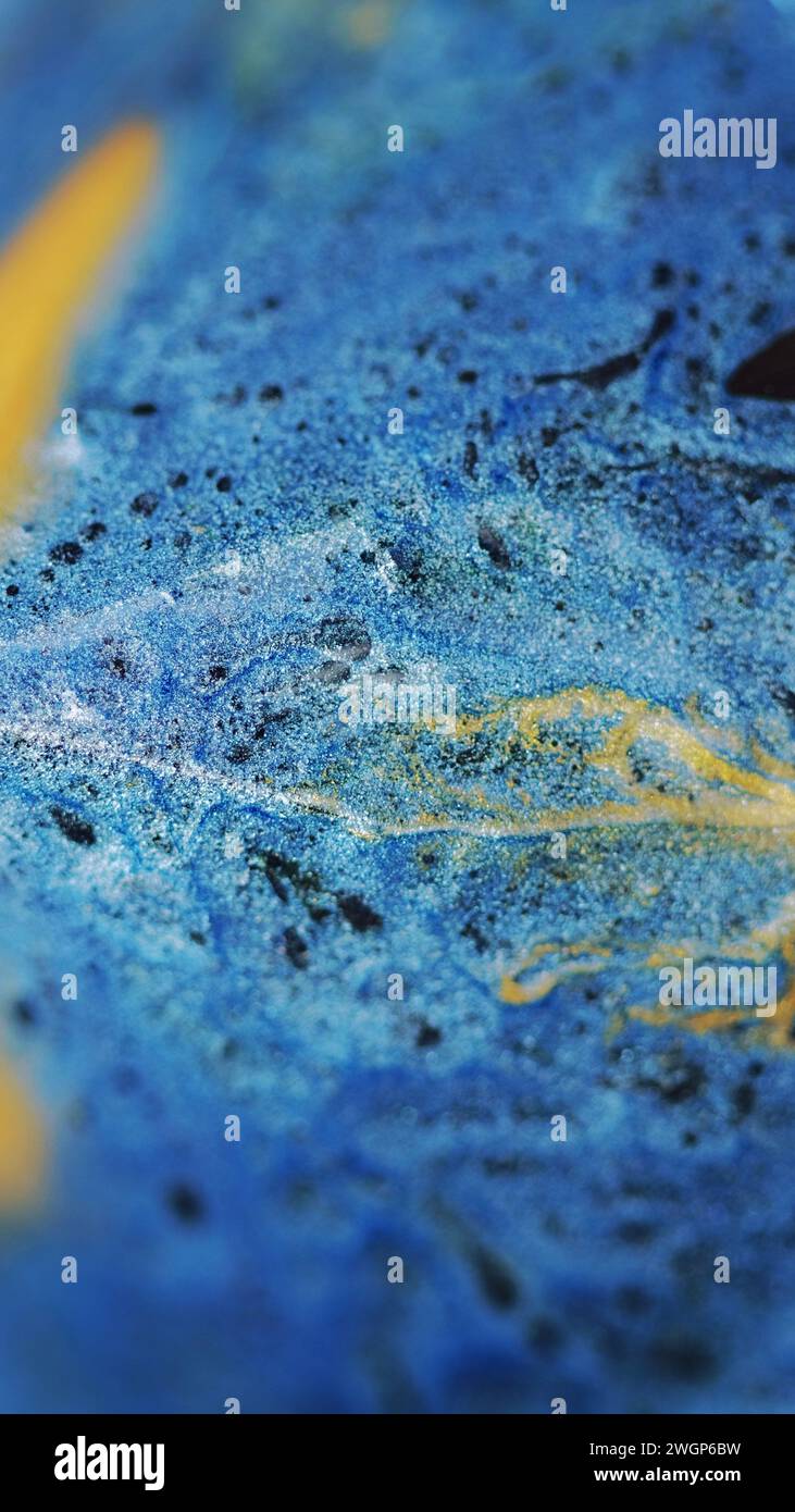 Abstract background pigment blend yellow blue Stock Photo - Alamy