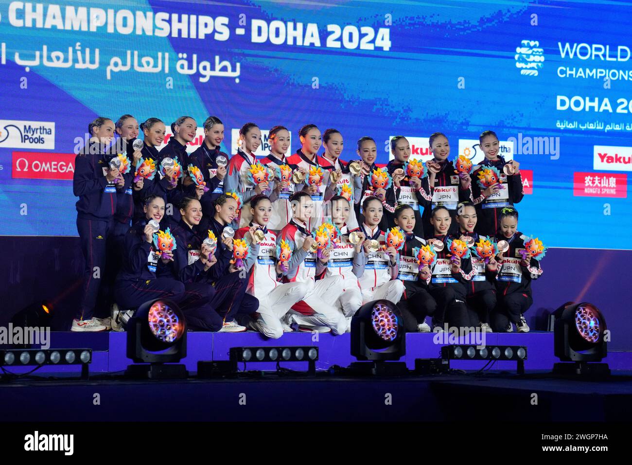Gold medalists China team, center, silver medalists Spain team and bronze medalists Japan team ...