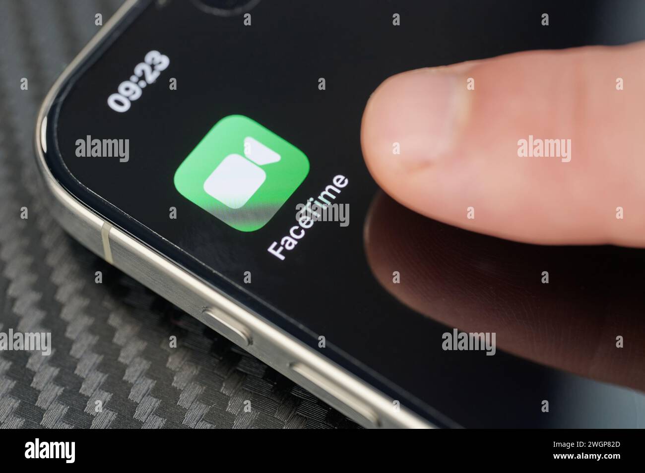 New York, USA - January 24, 2024: Touching top open FaceTime app icon with finger on iphone 15 ...