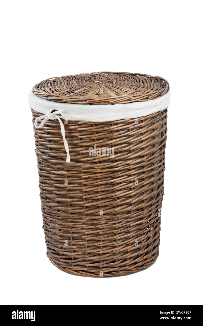 Wicker laundry basket with closed lid isolated on white background ...