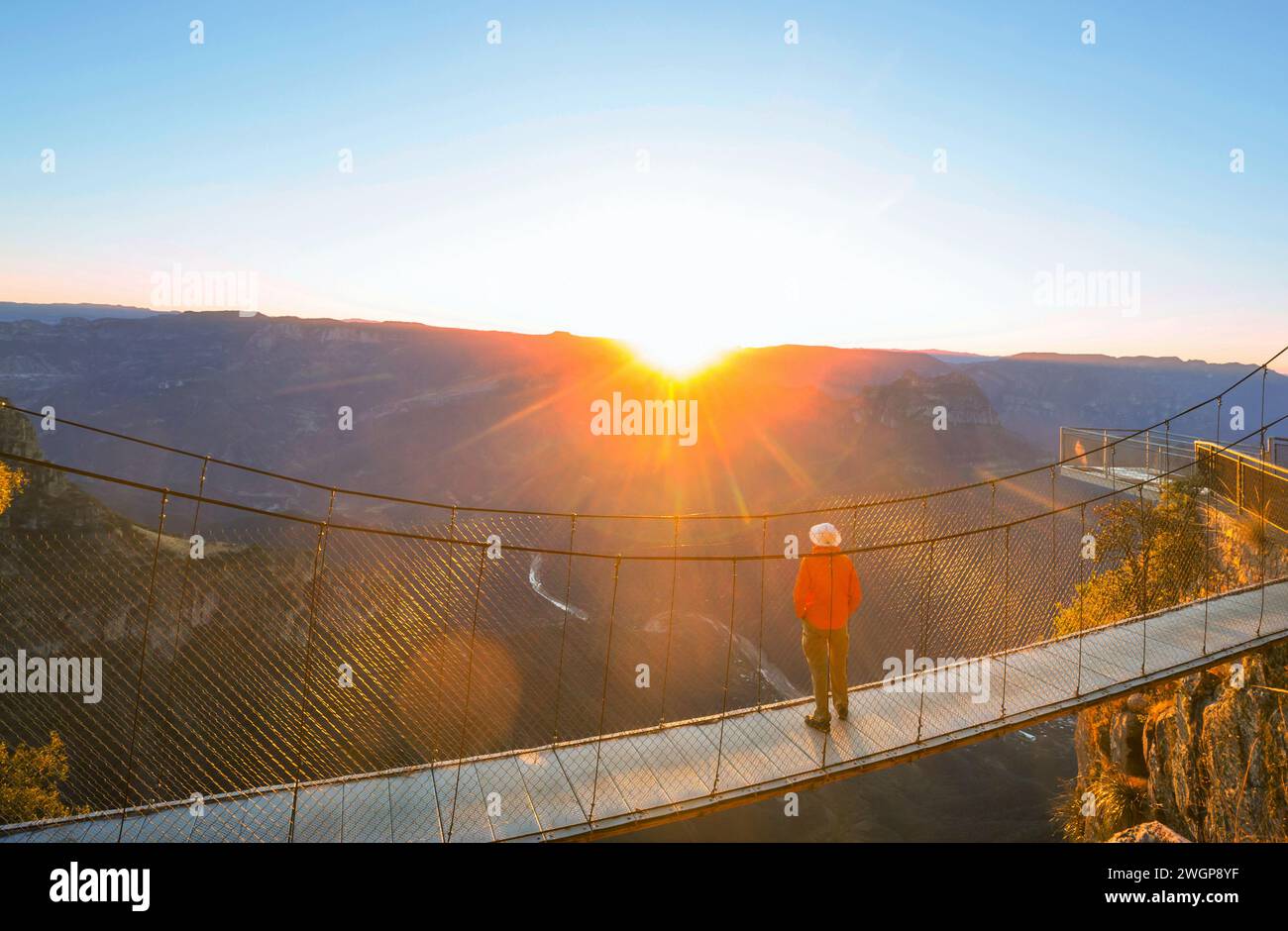 Man on the suspension bridge in Barrancas mountains, Mexico Stock Photo ...