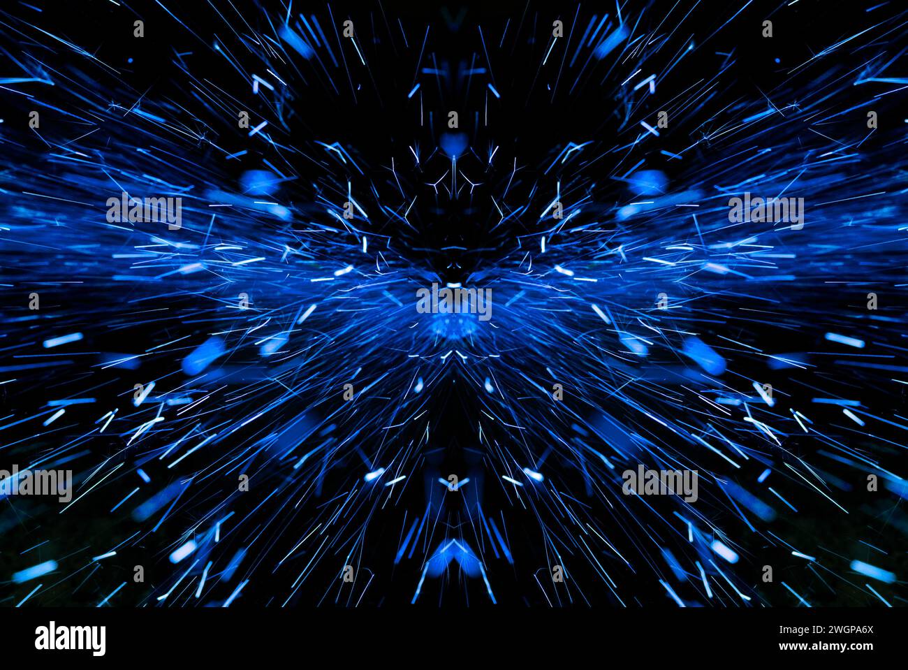 bright blue sparks on black background Stock Photo - Alamy