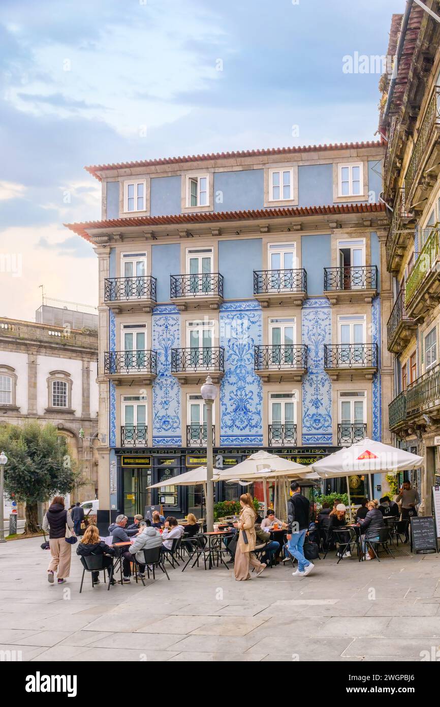 Tourists on a patio restaurant in the waterfront district, PORTO ...