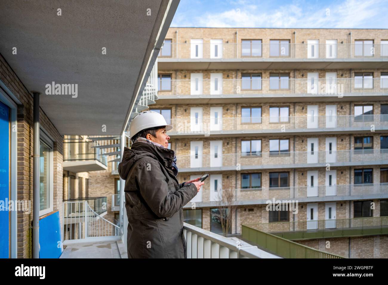 Female Construction manager walking around site Stock Photo - Alamy