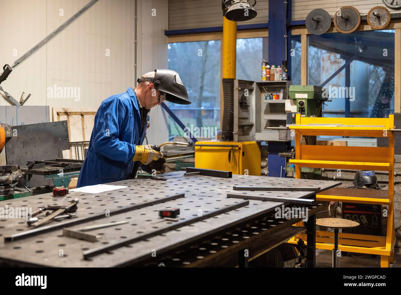 Manual worker standing working metal industry hi-res stock photography ...