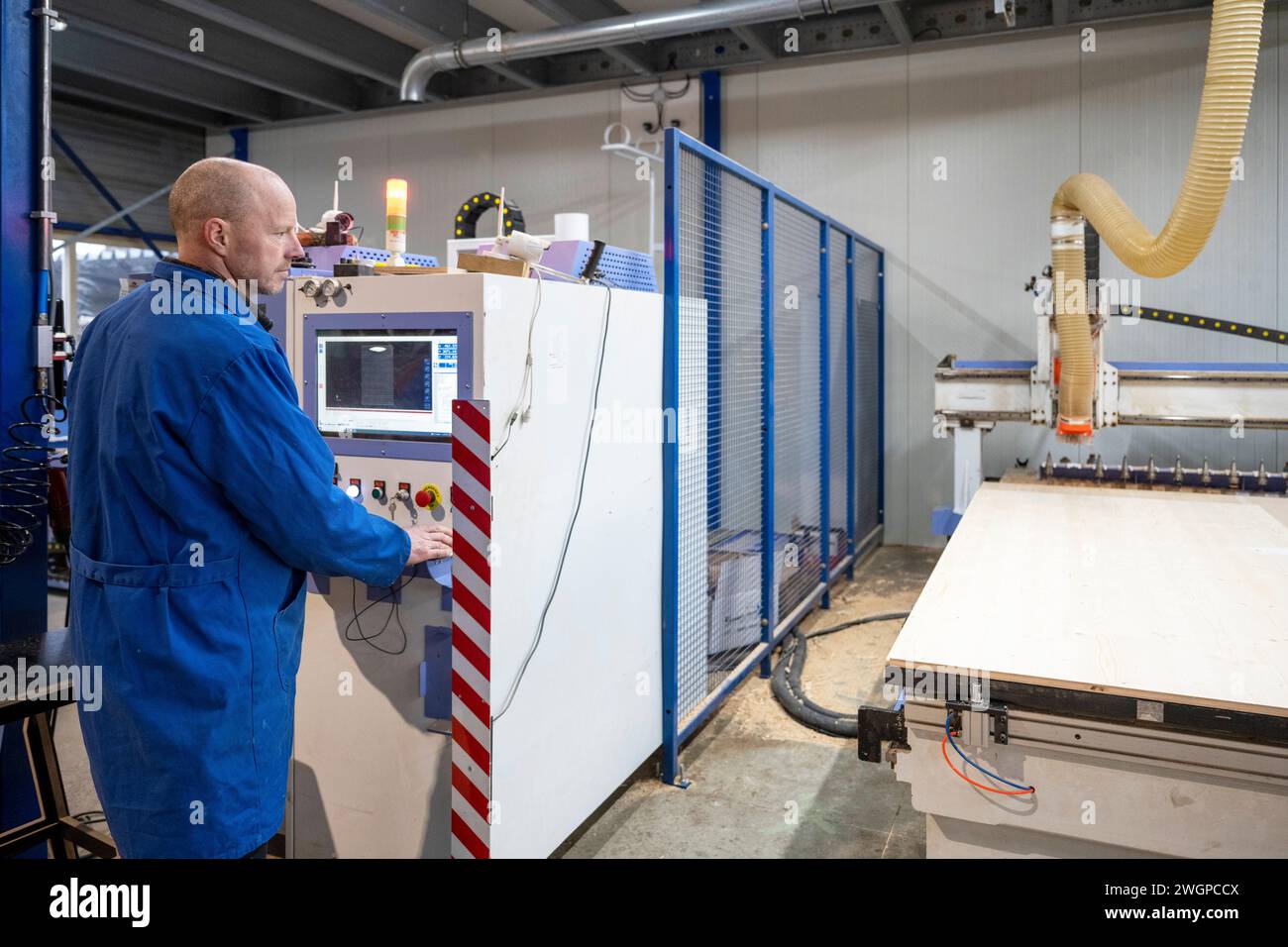 Manual worker standing working metal industry hi-res stock photography ...