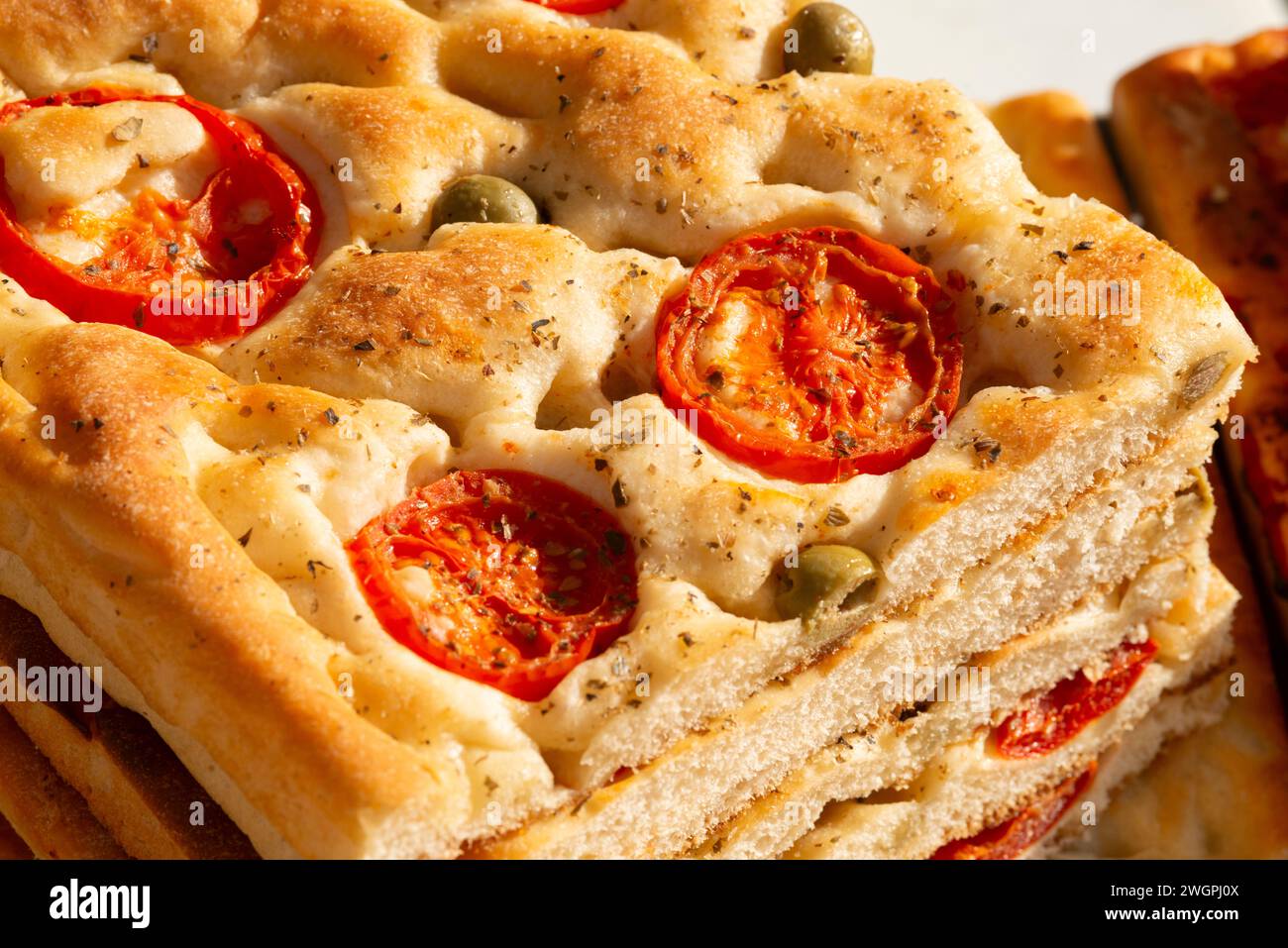 Ligurian Focaccia Bread called Focaccia alla Genovese whit Tomatos ...