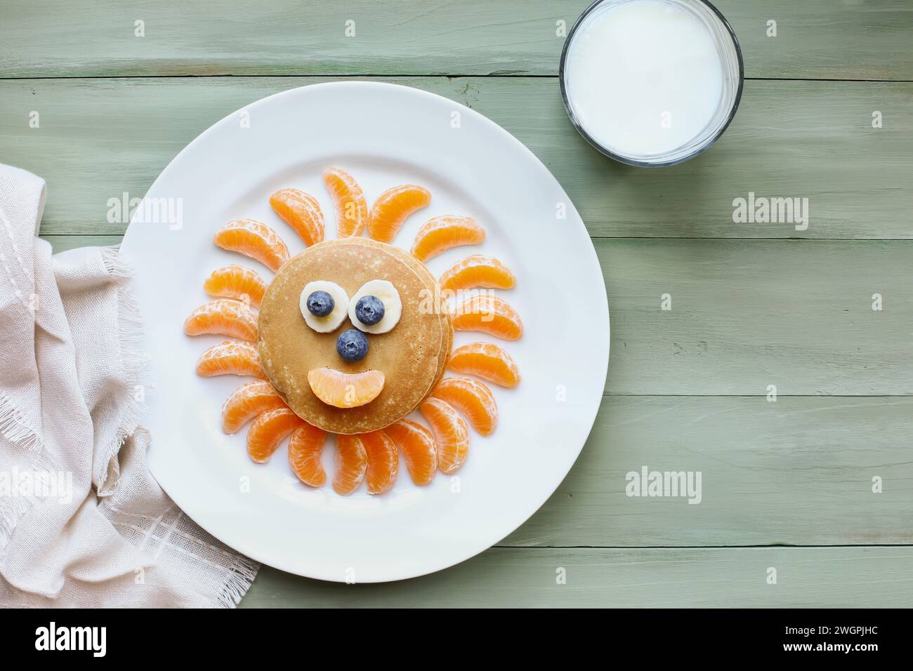 Fun, colorful creative pancake sun for children with banana and ...