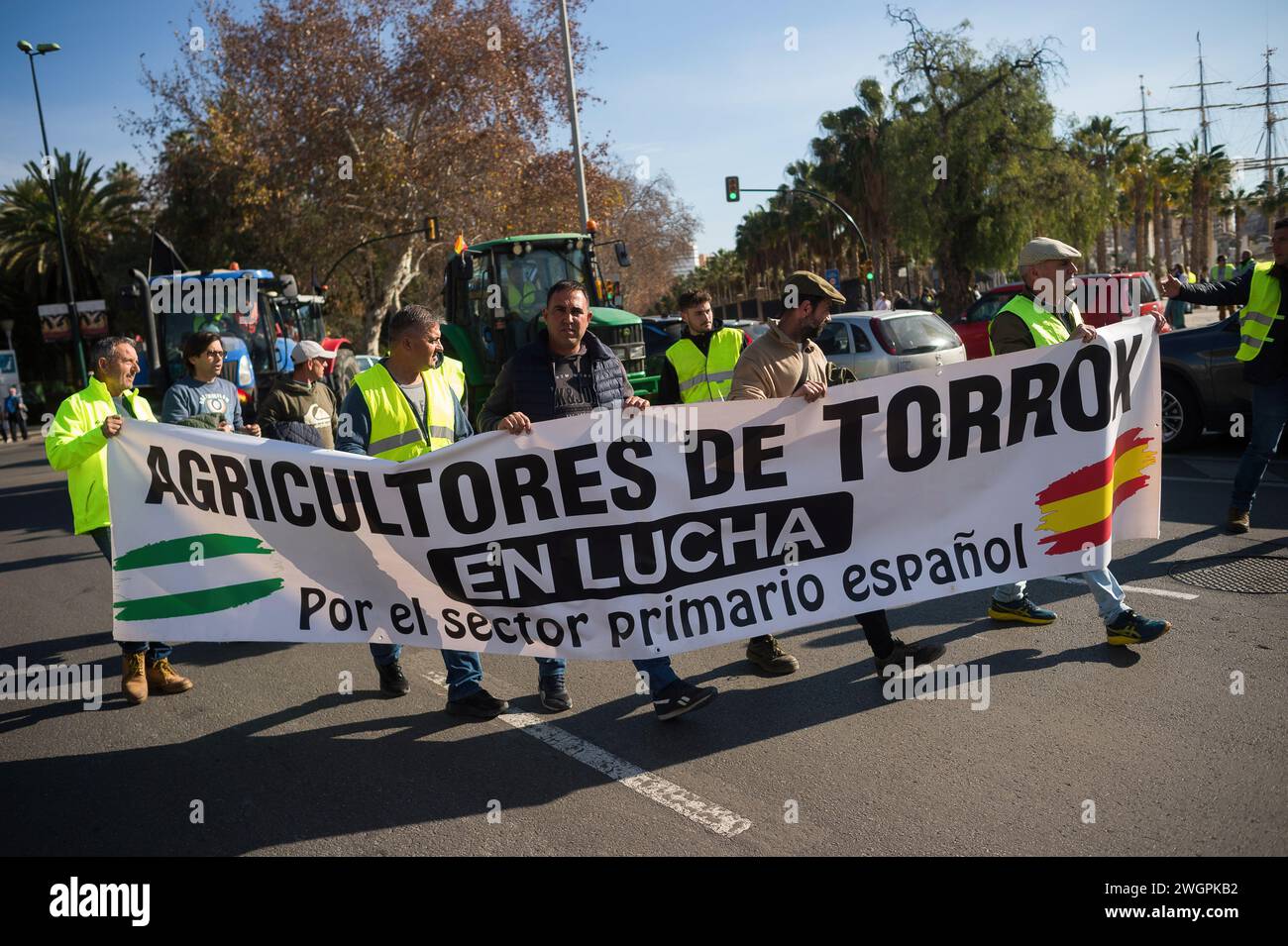Farmers are seen holding a large banner as they take part in a farmer's ...