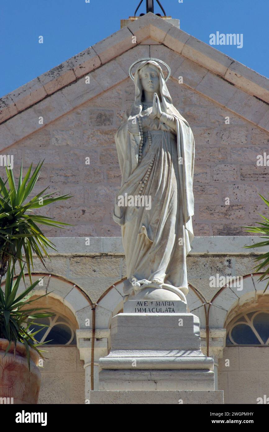 A statue of Immaculate Conception outside St. Catherine's Church in ...