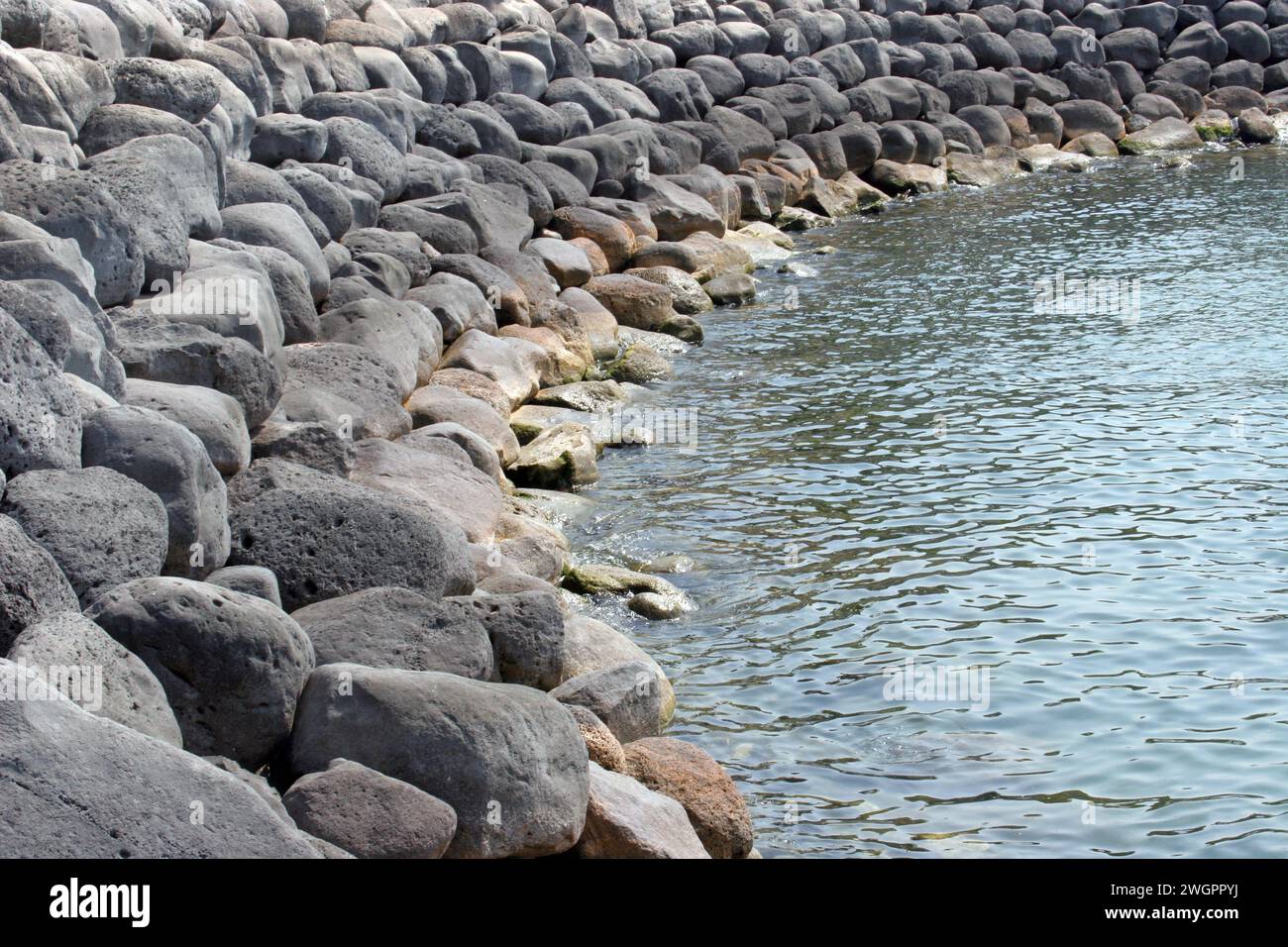 Rocky seascape, seashore in En Gev, Sea of Galilee, Israel Stock Photo ...