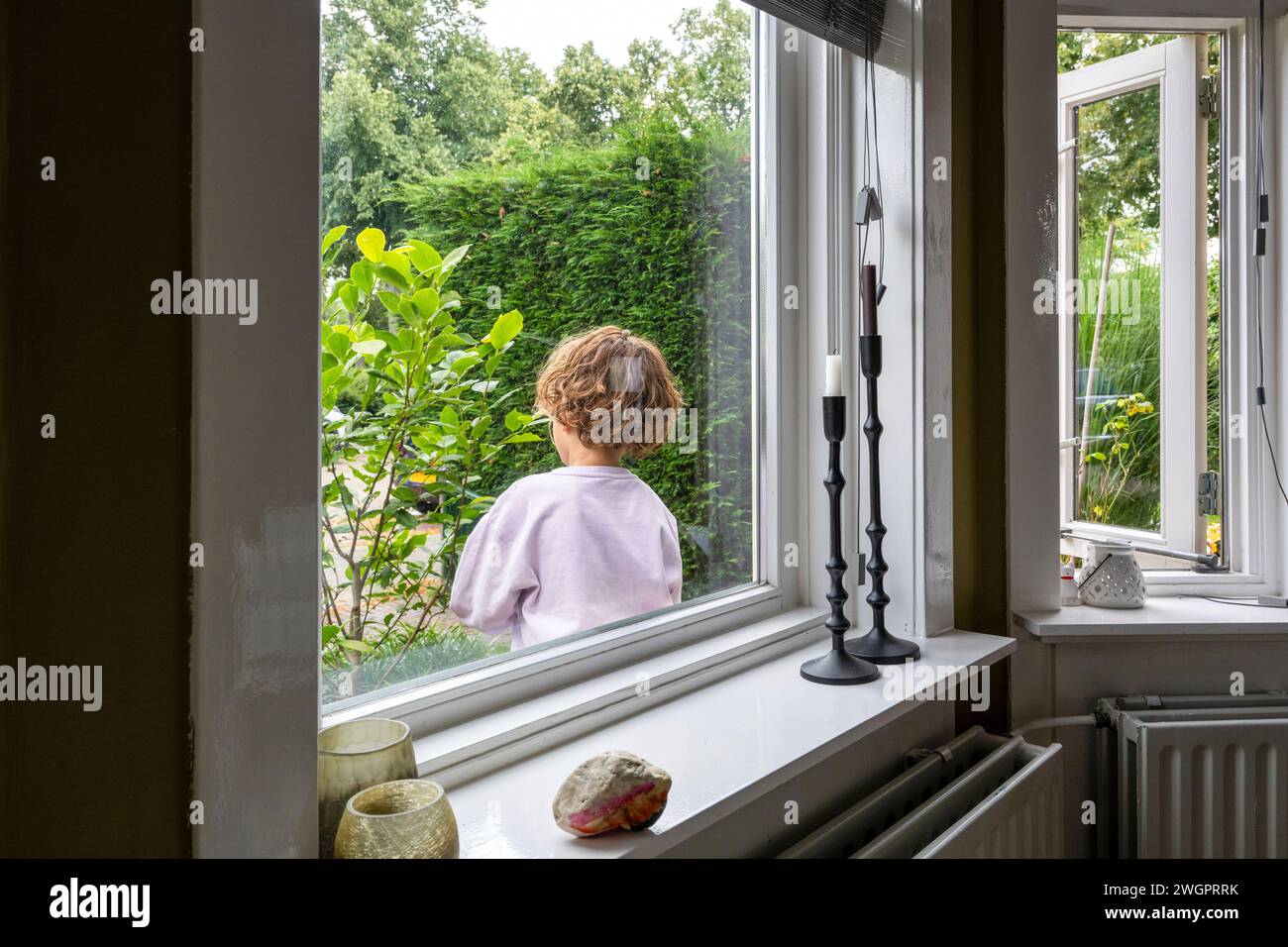 Domestic life through window hi-res stock photography and images - Alamy
