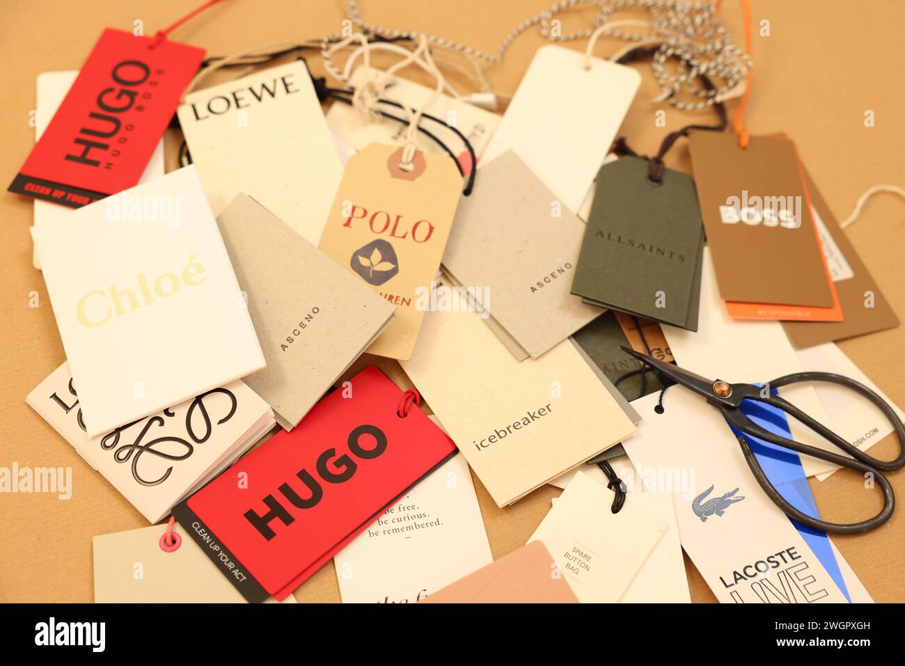 Leiden, Netherlands - December 6, 2023: Different clothing tags and ...