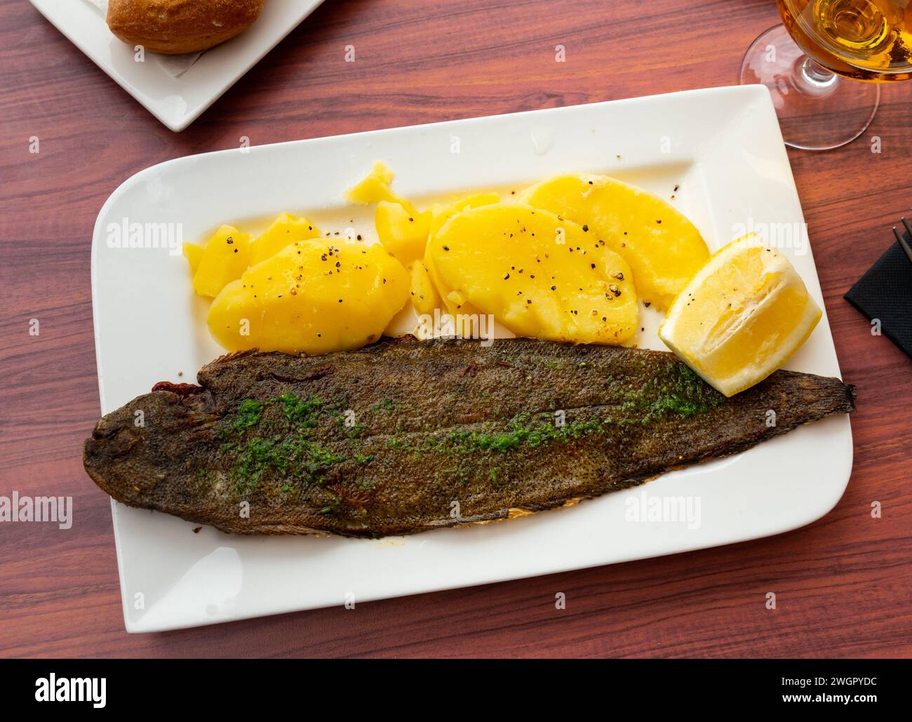 Lenguado fish (sea tongue or European salt) baked served with stewed ...