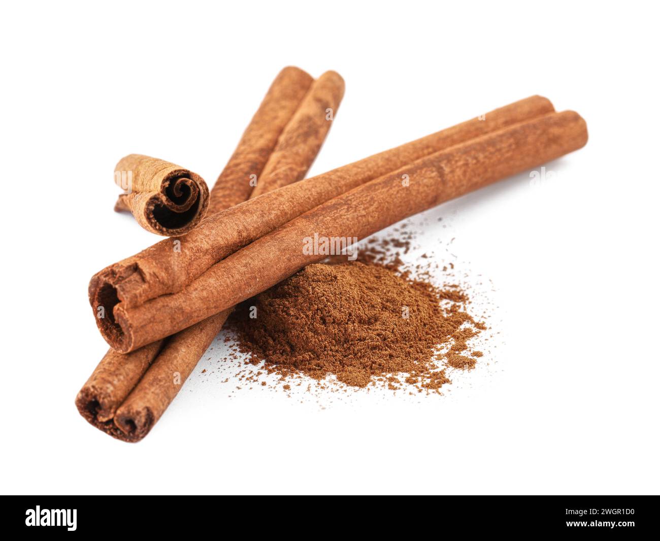 Dry aromatic cinnamon sticks and powder isolated on white Stock Photo ...