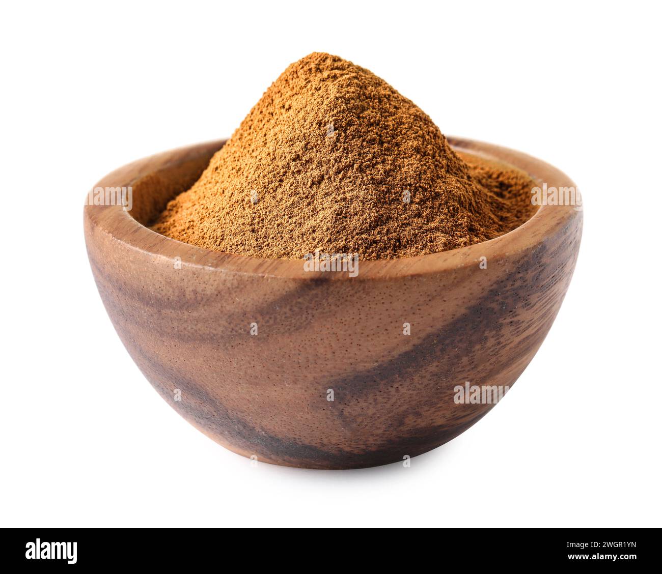 Dry aromatic cinnamon powder in wooden bowl isolated on white Stock ...