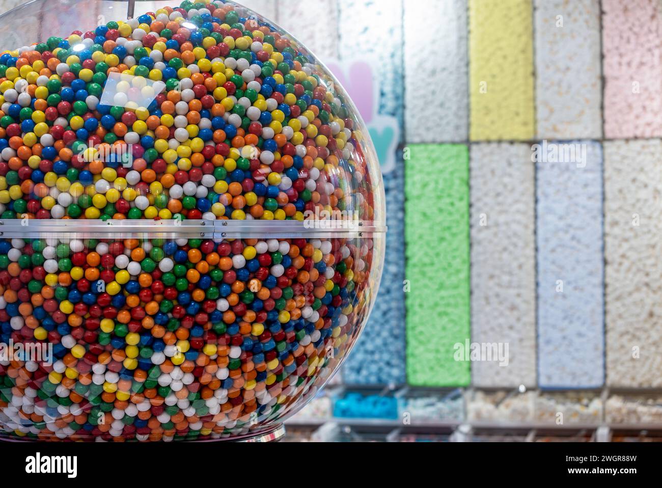 showcase of candy shop, transparent container with various sweets ...