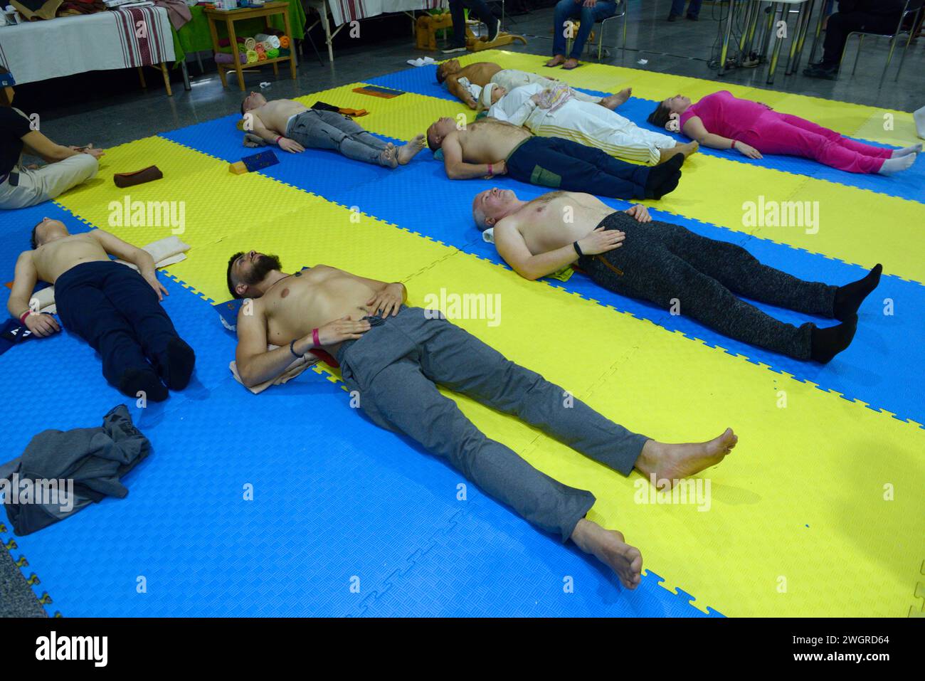 Group of people lay on Lyapko acupuncture mats. May 15, 2021. Kyiv ...