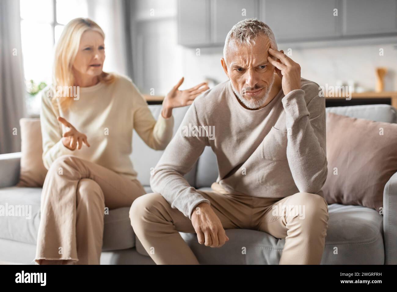 Furious senior woman yelling at her frustrated husband Stock Photo - Alamy