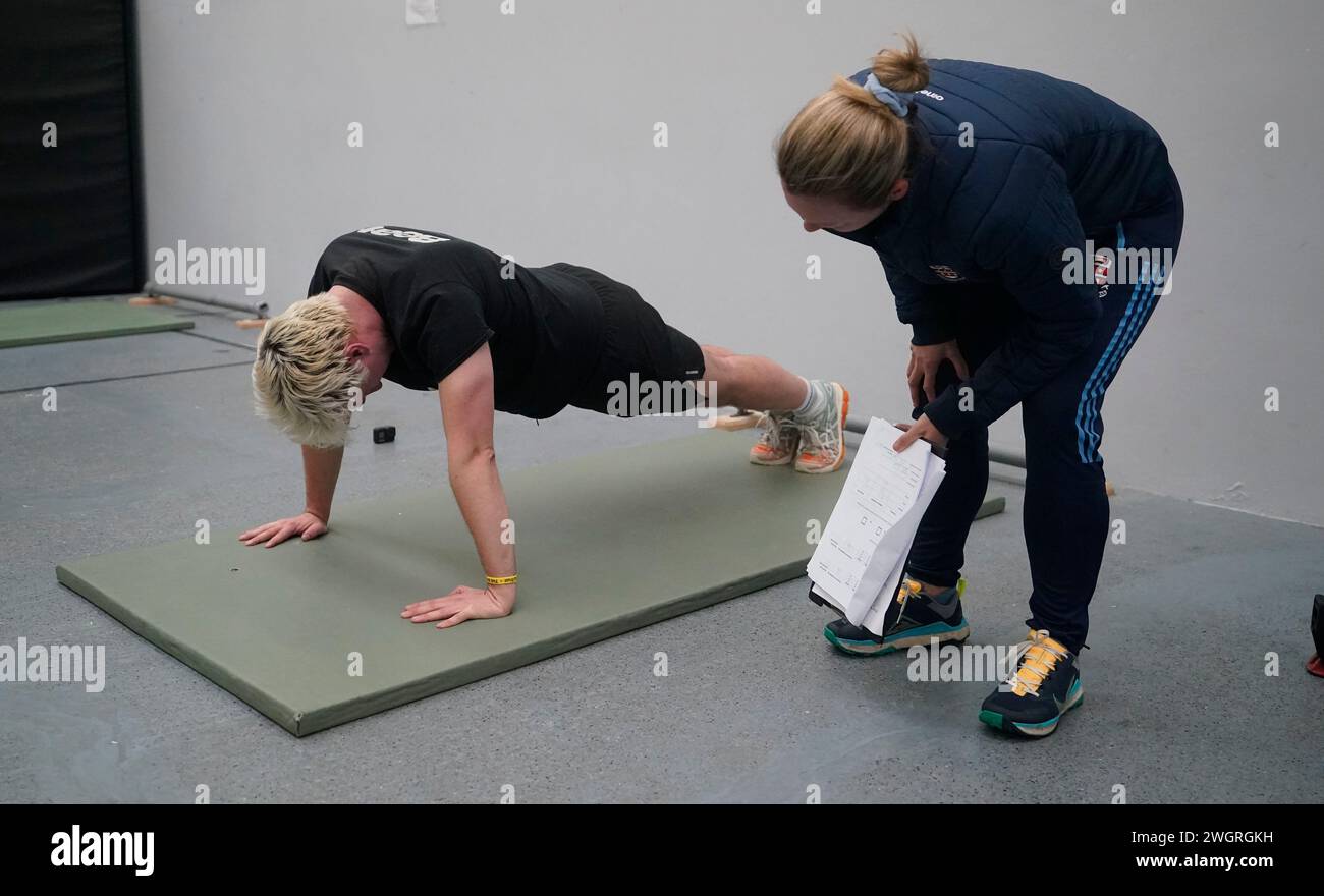 Garda Orla McDonald monitors a journalist Brian Griffin taking part in ...