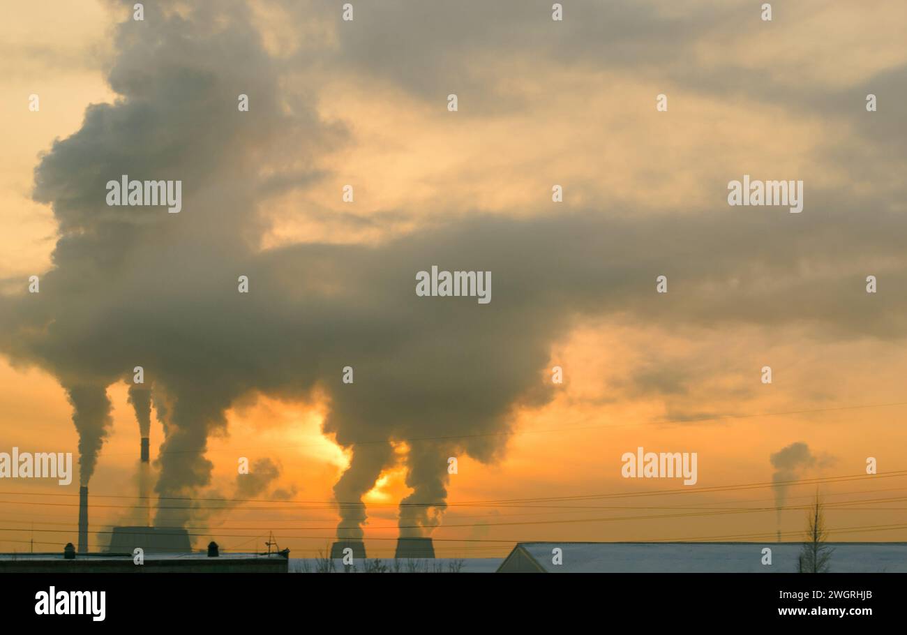 Industrial landscape in Russia. Smoke from Cogeneration rises very high ...
