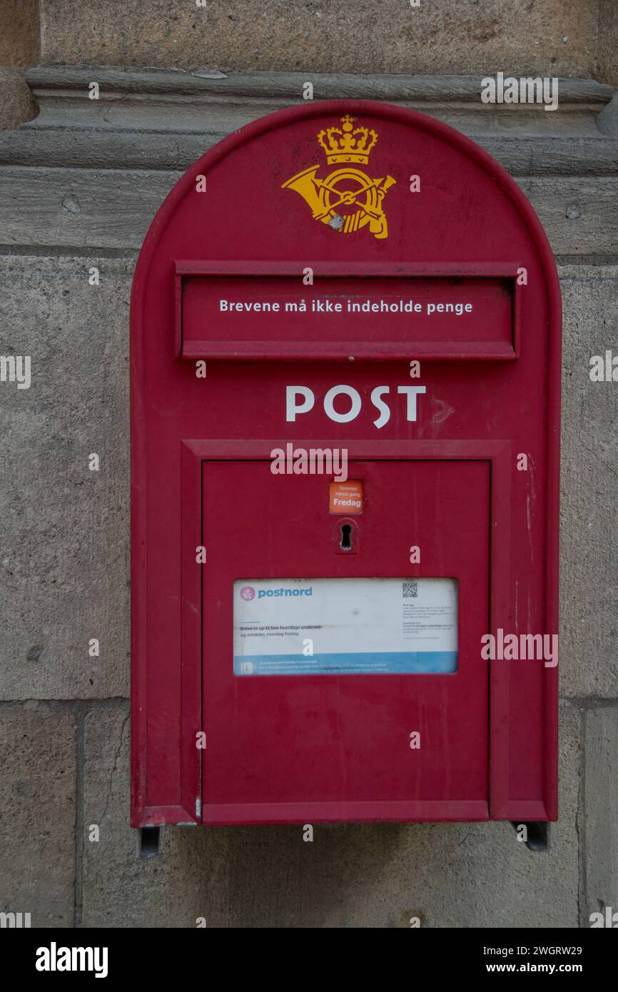Sonderborg, Denmark 16 May 2023, Red Danish mailbox on a facade Stock ...