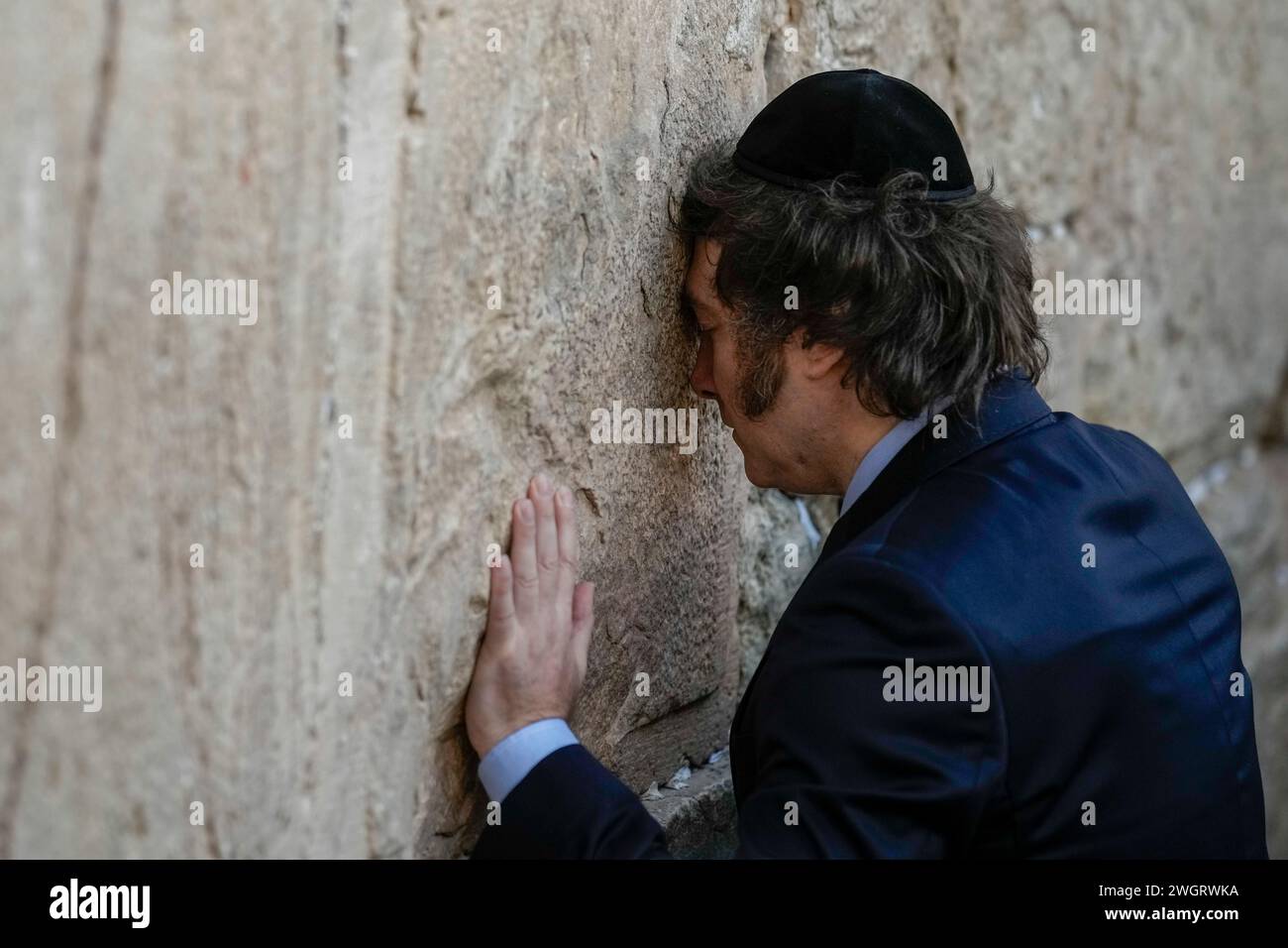 Argentine President Javier Milei touches the Western Wall, the holiest ...