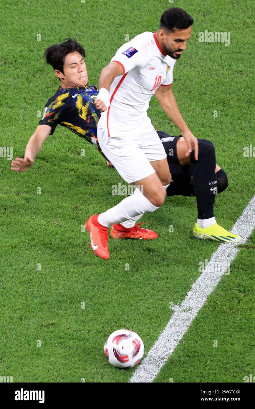 Jordan's Mousa Altamari, right, and South Korea's Seol Young-woo fight ...