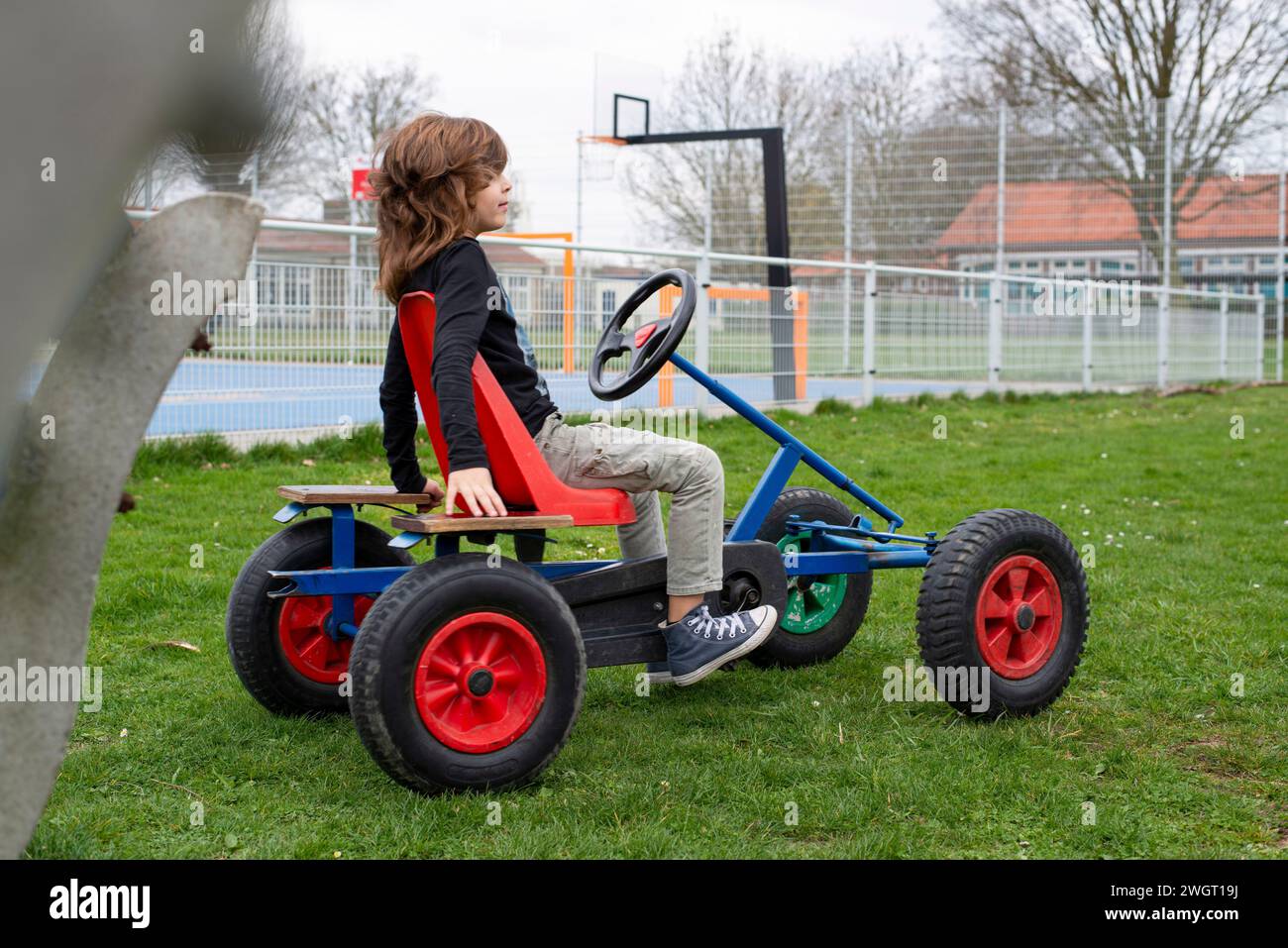 Boy driving tractor hi-res stock photography and images - Alamy