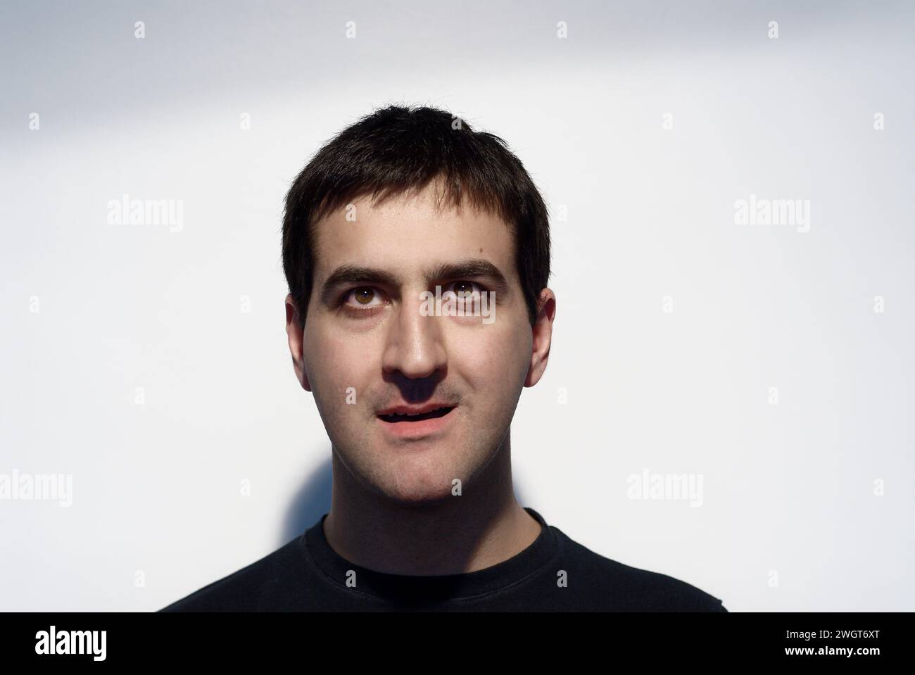 Adult man grimacing with his face and gesturing with his hands Stock ...