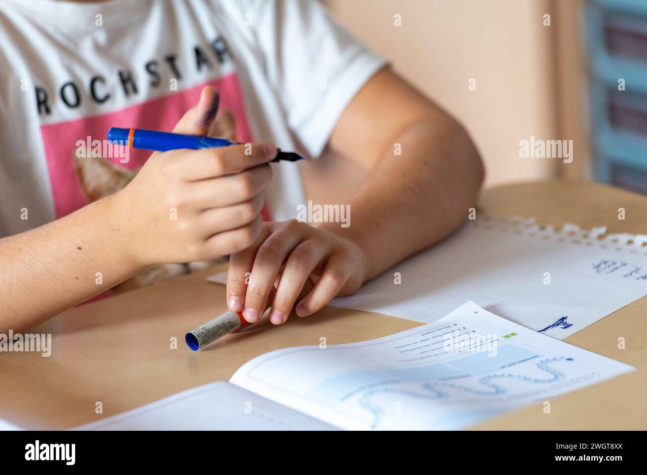 Class writing hi-res stock photography and images - Alamy