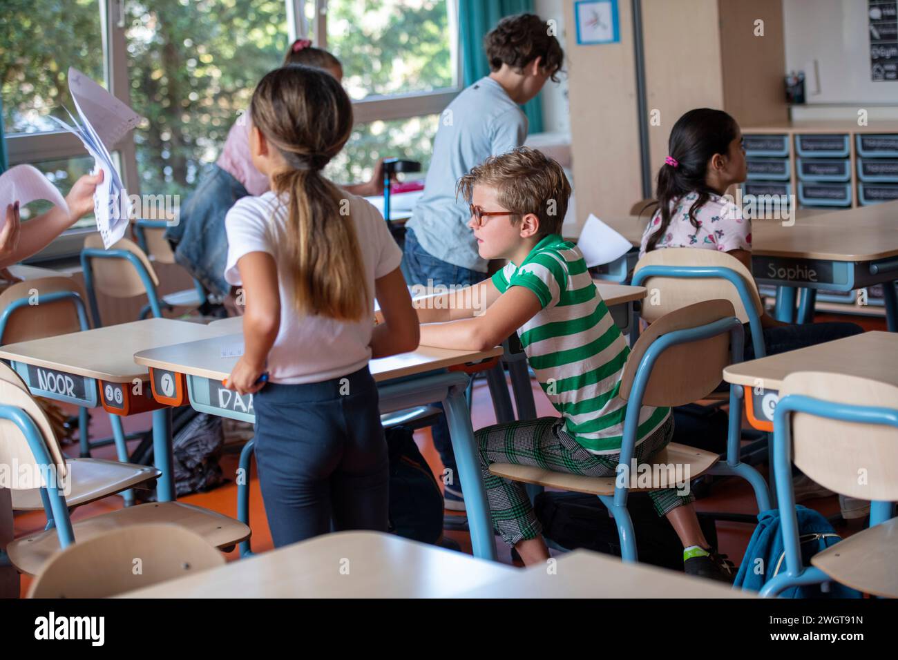 Group standing around desk in hi-res stock photography and images - Alamy