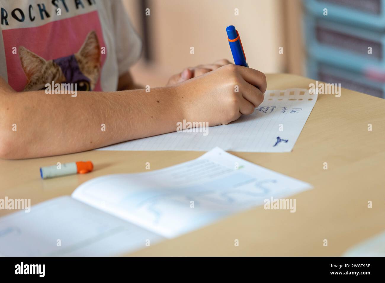 Class writing hi-res stock photography and images - Alamy