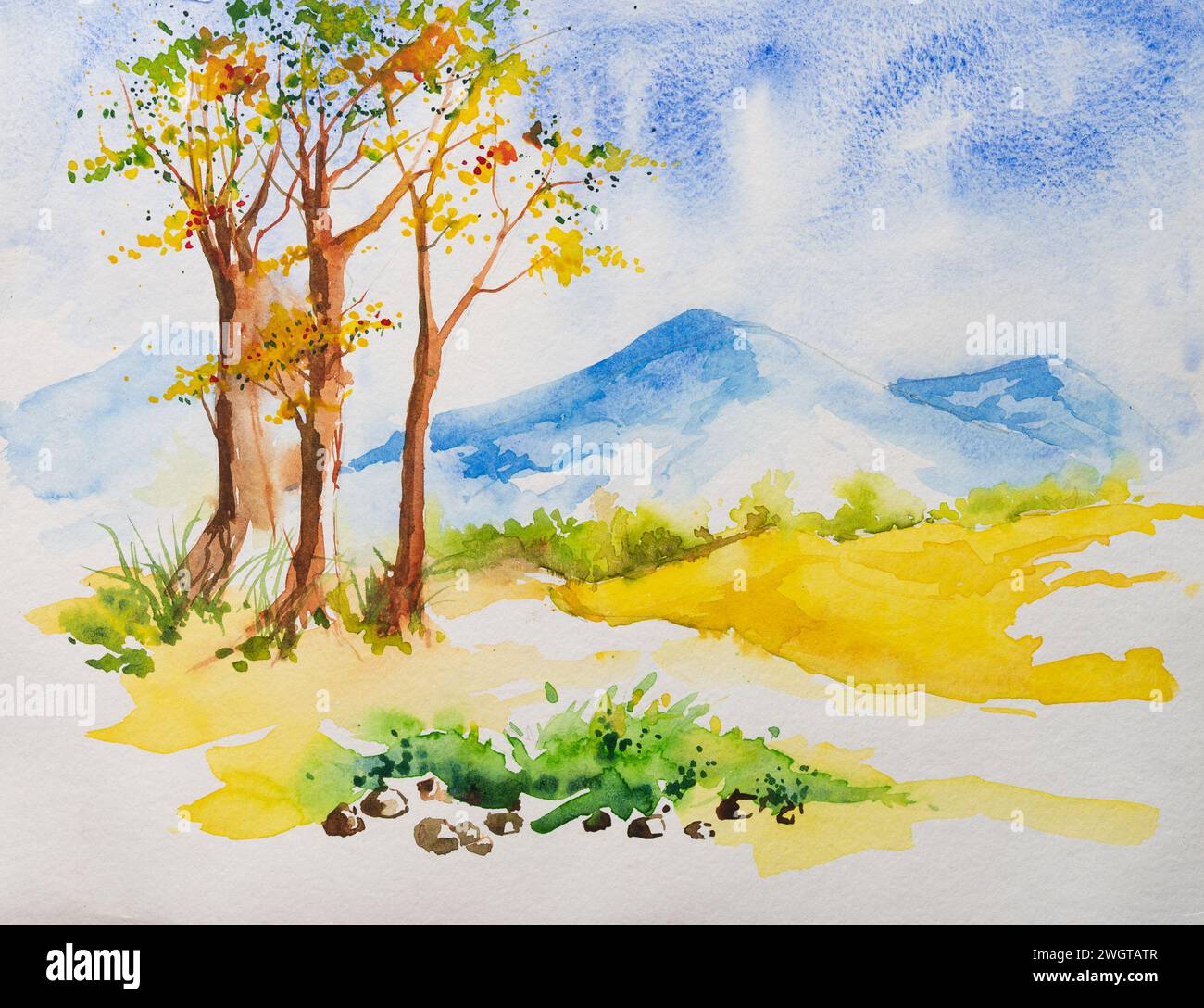 Watercolor painting of Indian mountains with green trees , yellow field ...